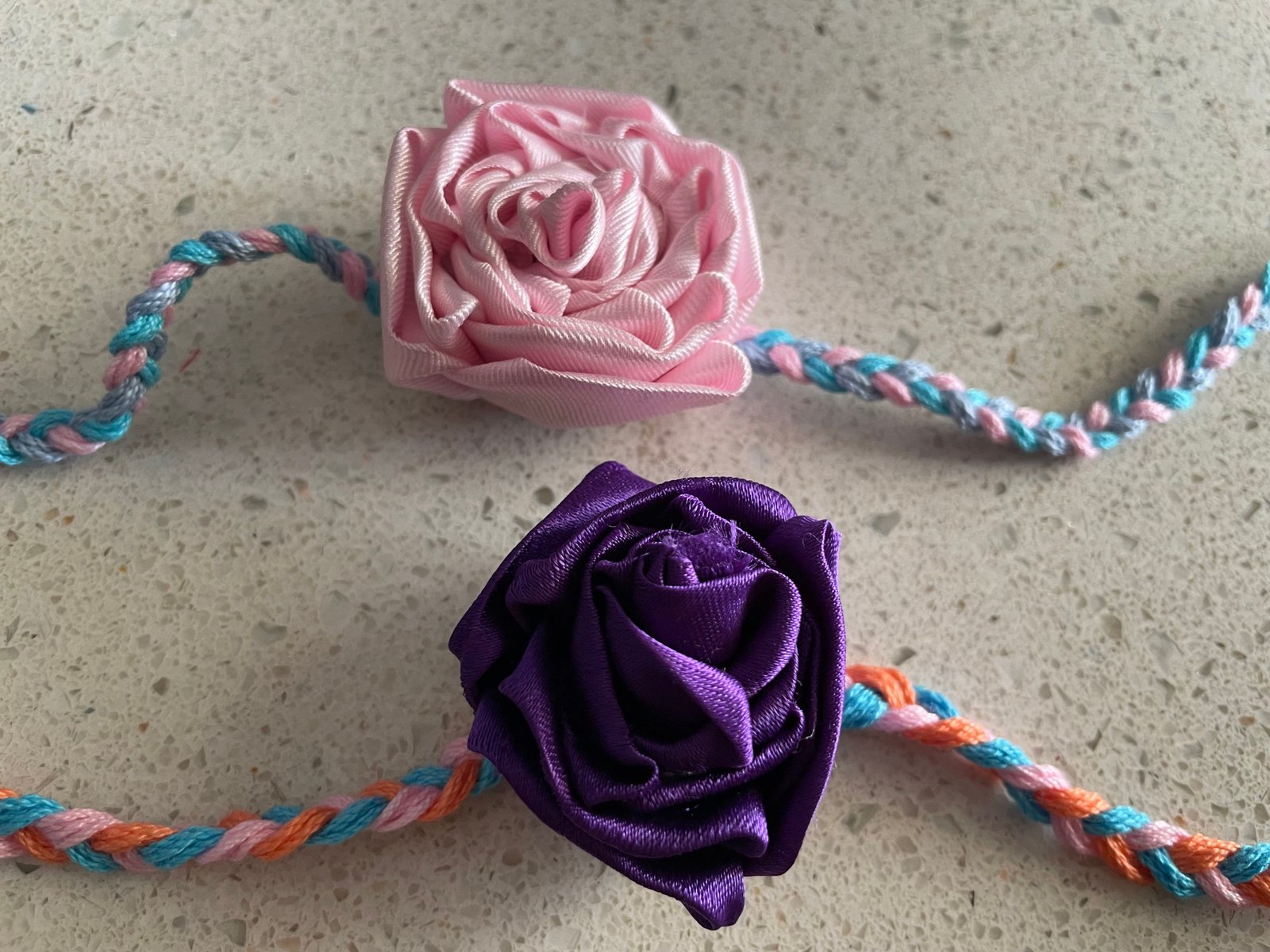 Gulab Purple & LTPink Rakhi set of 2 - Bells & Whistles